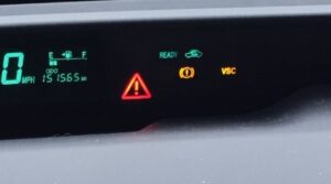 Why is the Toyota Prius Master Warning Light on?
